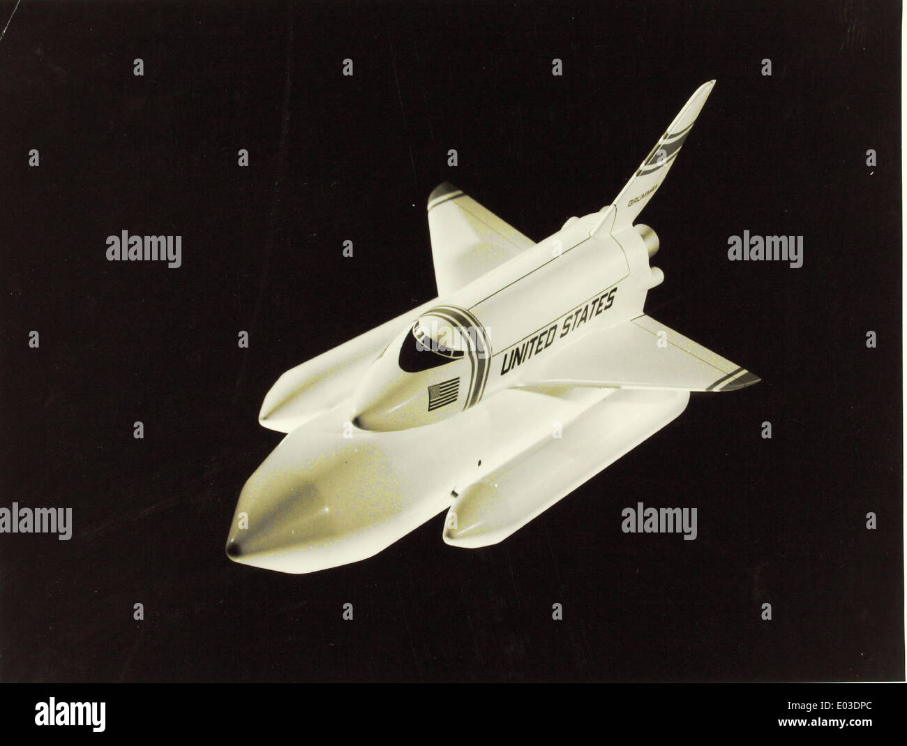 This glossy photo from NASA's Space Shuttle Program shows the Space Shuttle in action between ...