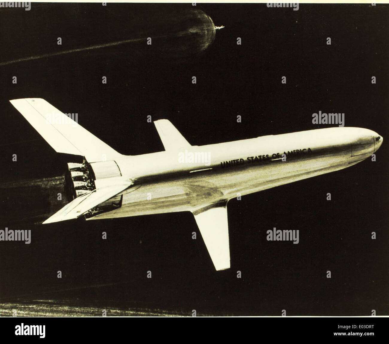 This glossy photograph captures the Space Shuttle Program, a major ...