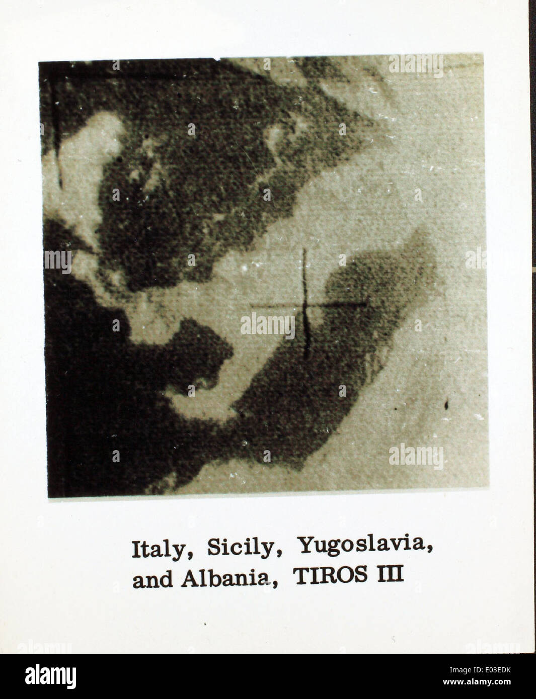 This glossy photo depicts one of NASA’s Tiros satellites, part of the ...