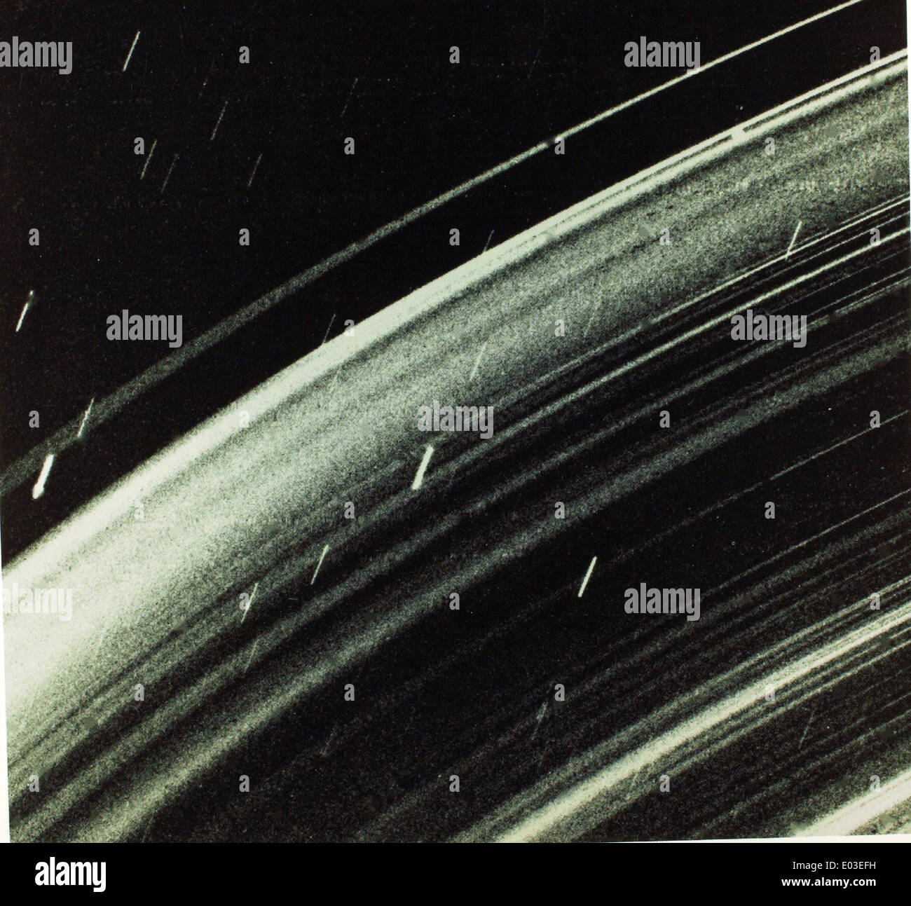 This glossy photograph features the NASA Voyager spacecraft, which was launched in 1977 for the ...