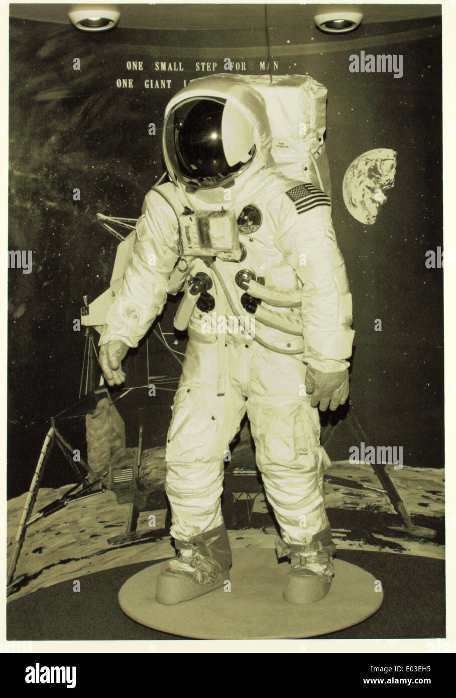 This glossy photo showcases a NASA space suit, highlighting the ...