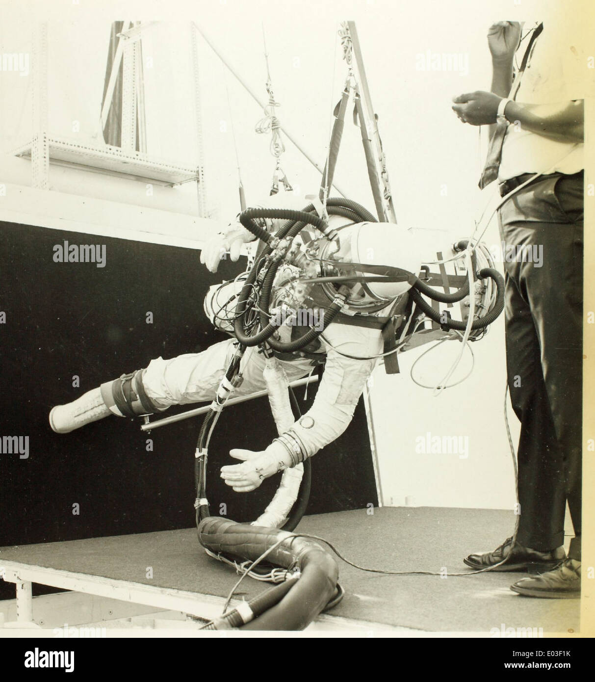 This glossy photo showcases NASA space suits, used by astronauts during ...