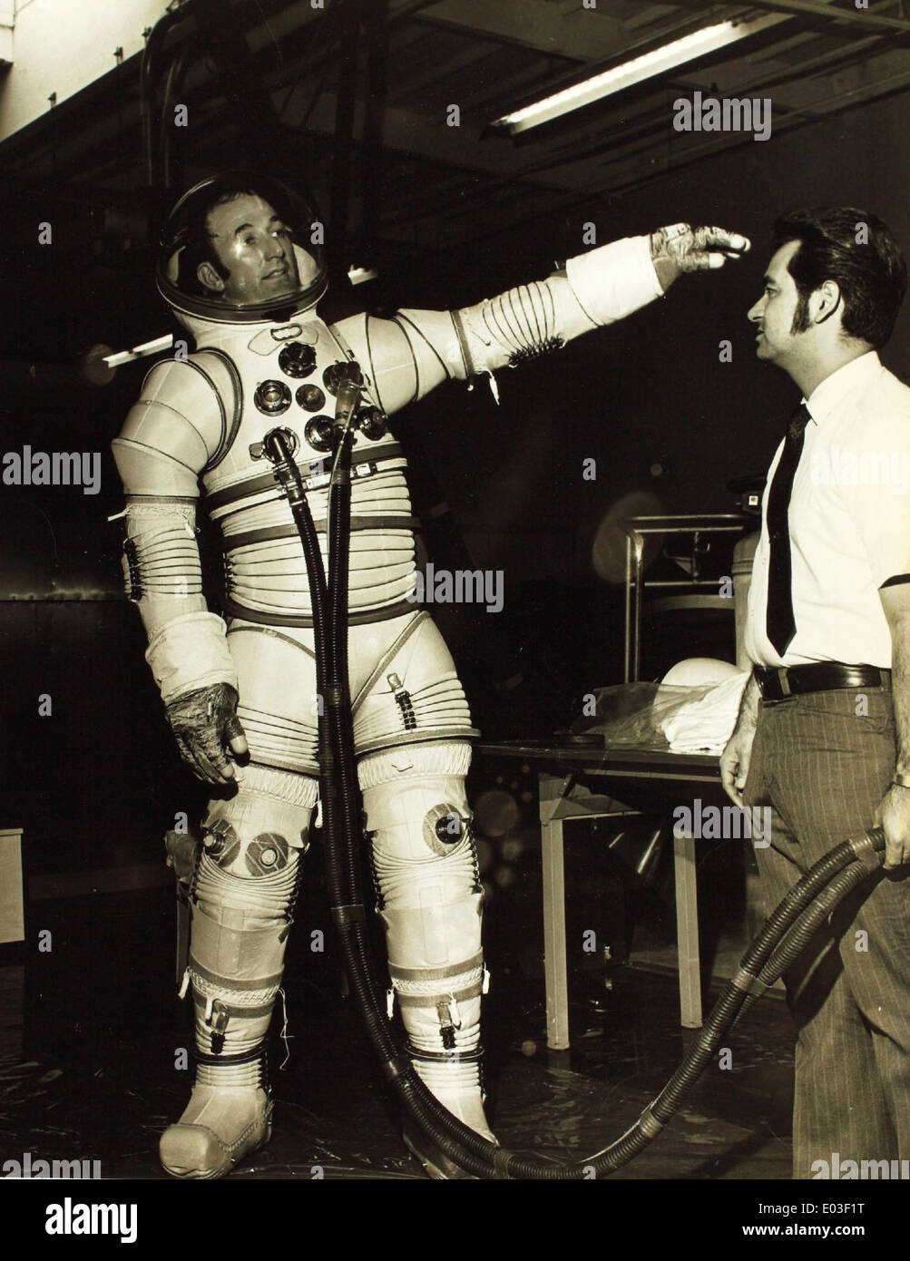 A high-quality glossy photo showcasing NASA space suits, used by ...