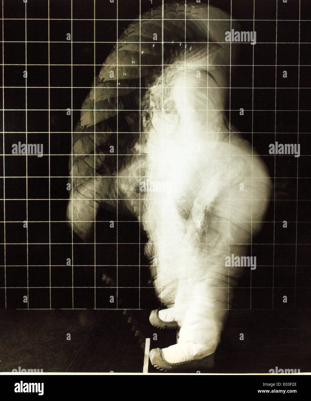This glossy photo features a NASA astronaut in a space suit, showcasing ...