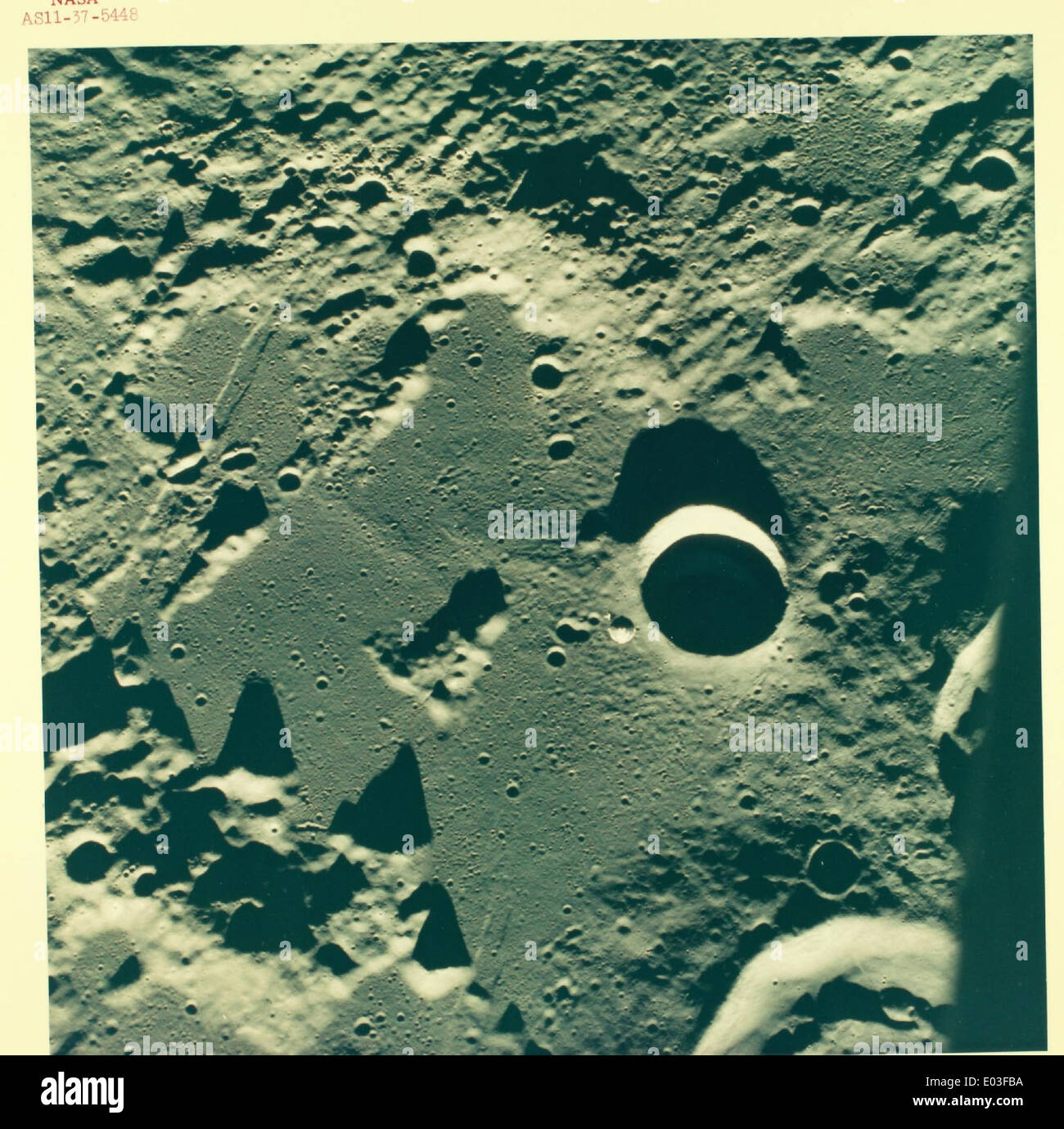 A glossy photo of the Moon taken by NASA, showcasing the lunar surface ...