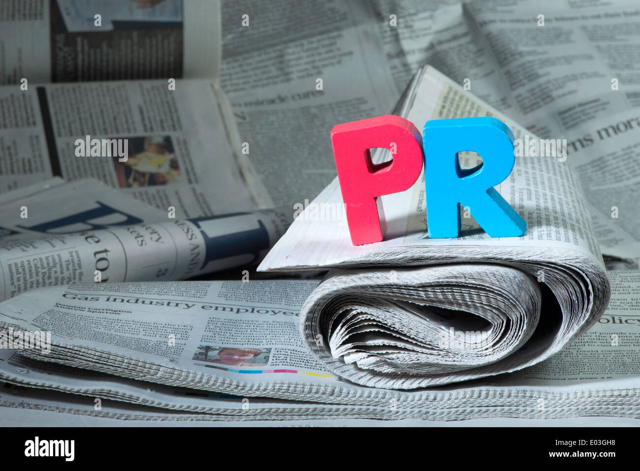 Red news word on newspaper hi-res stock photography and images - Alamy