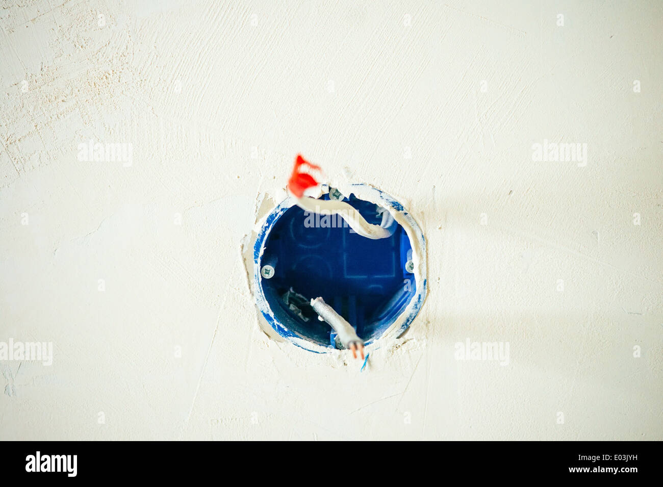 Minimalistic Background with electrical socket and open wire electric ...