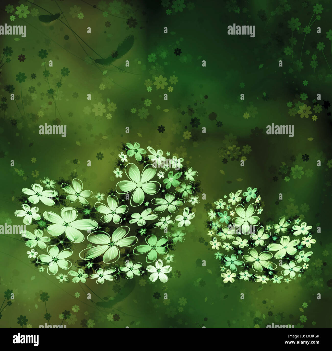 Two hearts from flowers on a green background Stock Photo - Alamy