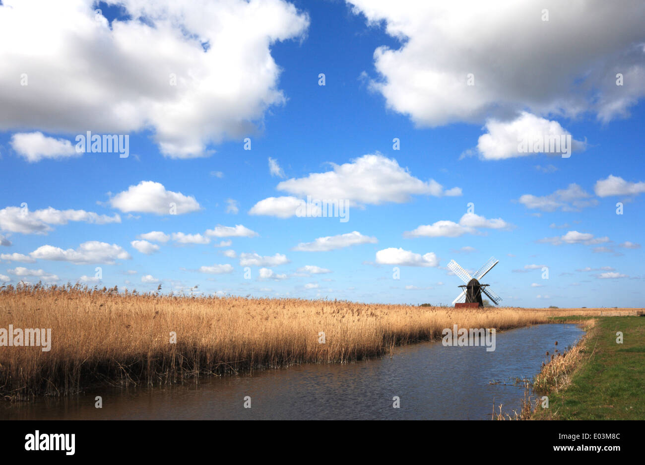 A landscape with dyke and windmill in the Waveney valley at ...