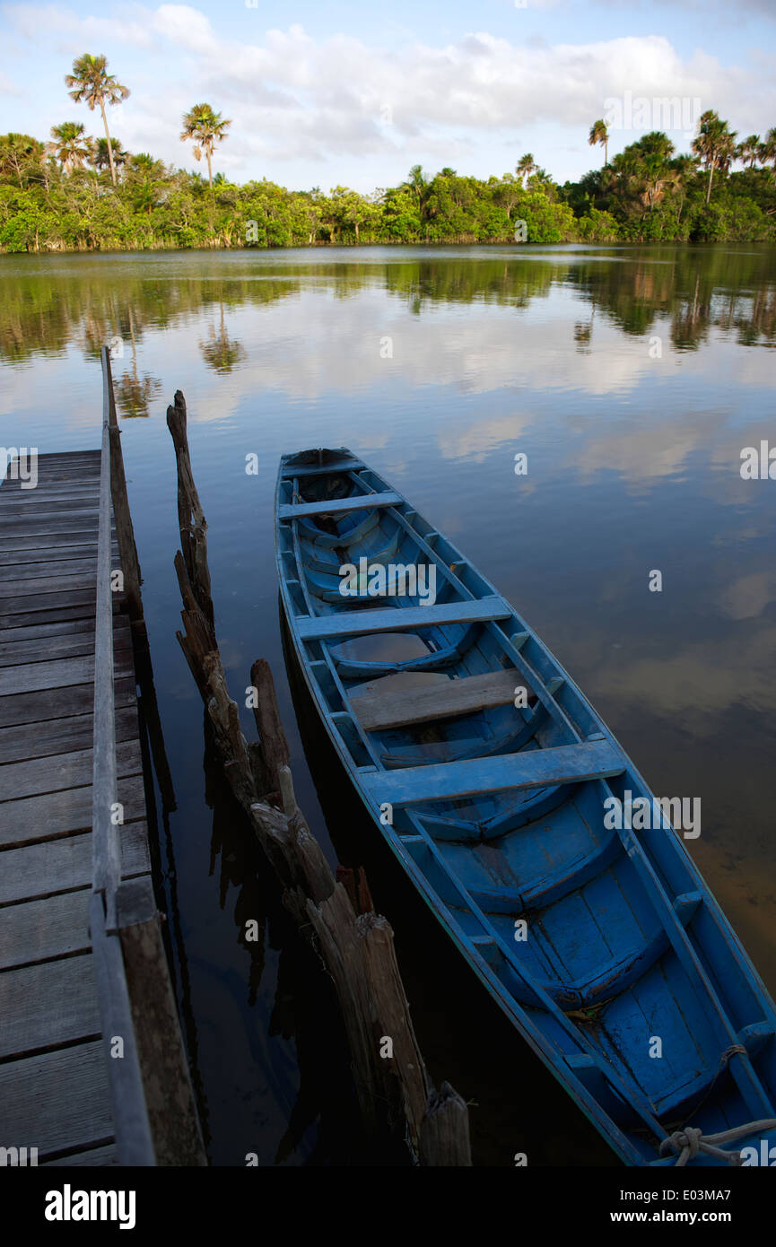 Calm rural Brazilian scene with morning reflection tropical shore of ...