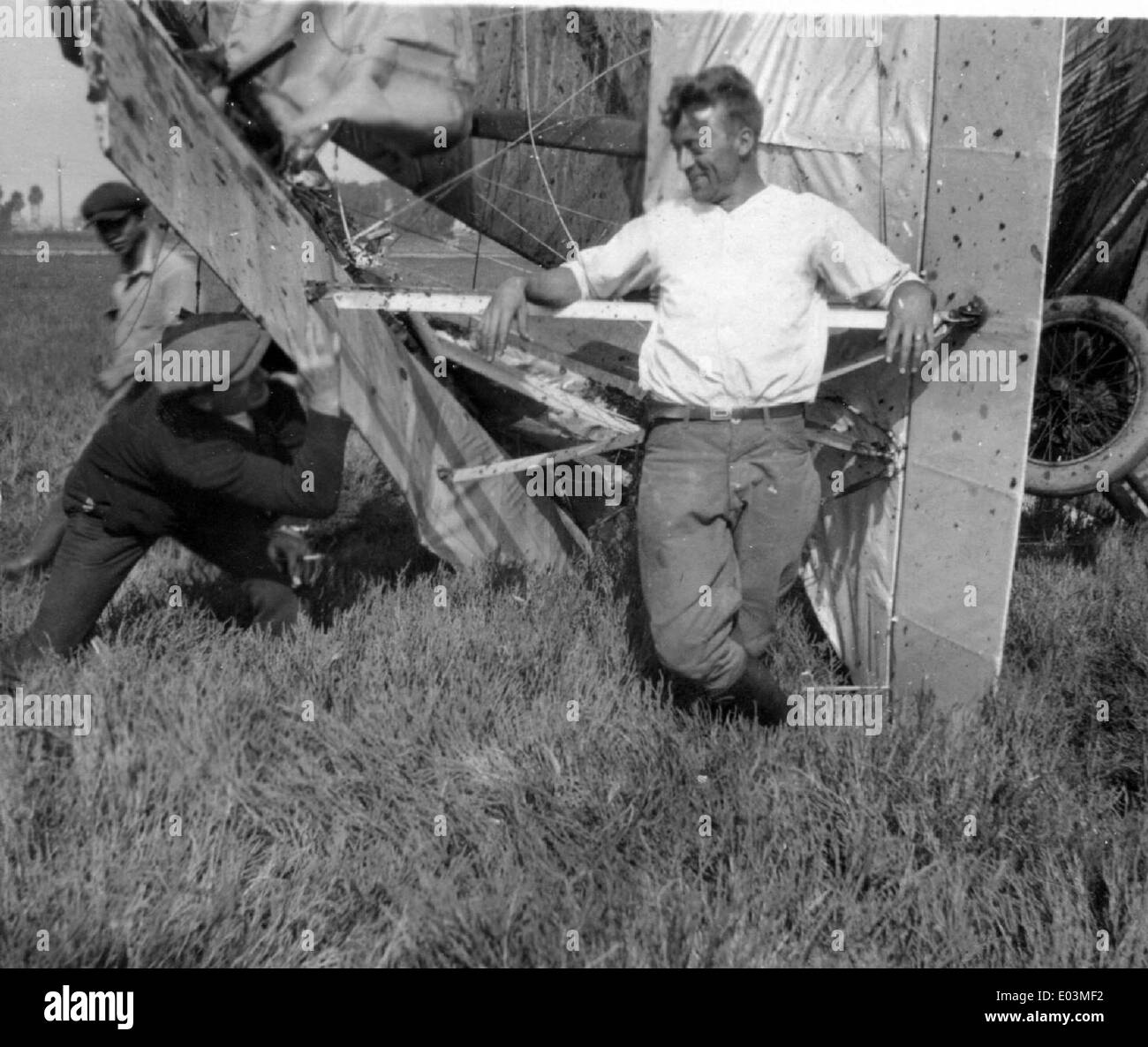 This image from 1919 depicts pilots standing next to their wrecked ...