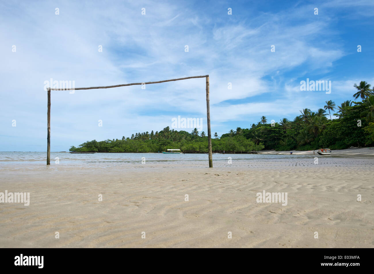 Simple empty Brazilian beach football pitch with rustic goal posts ...