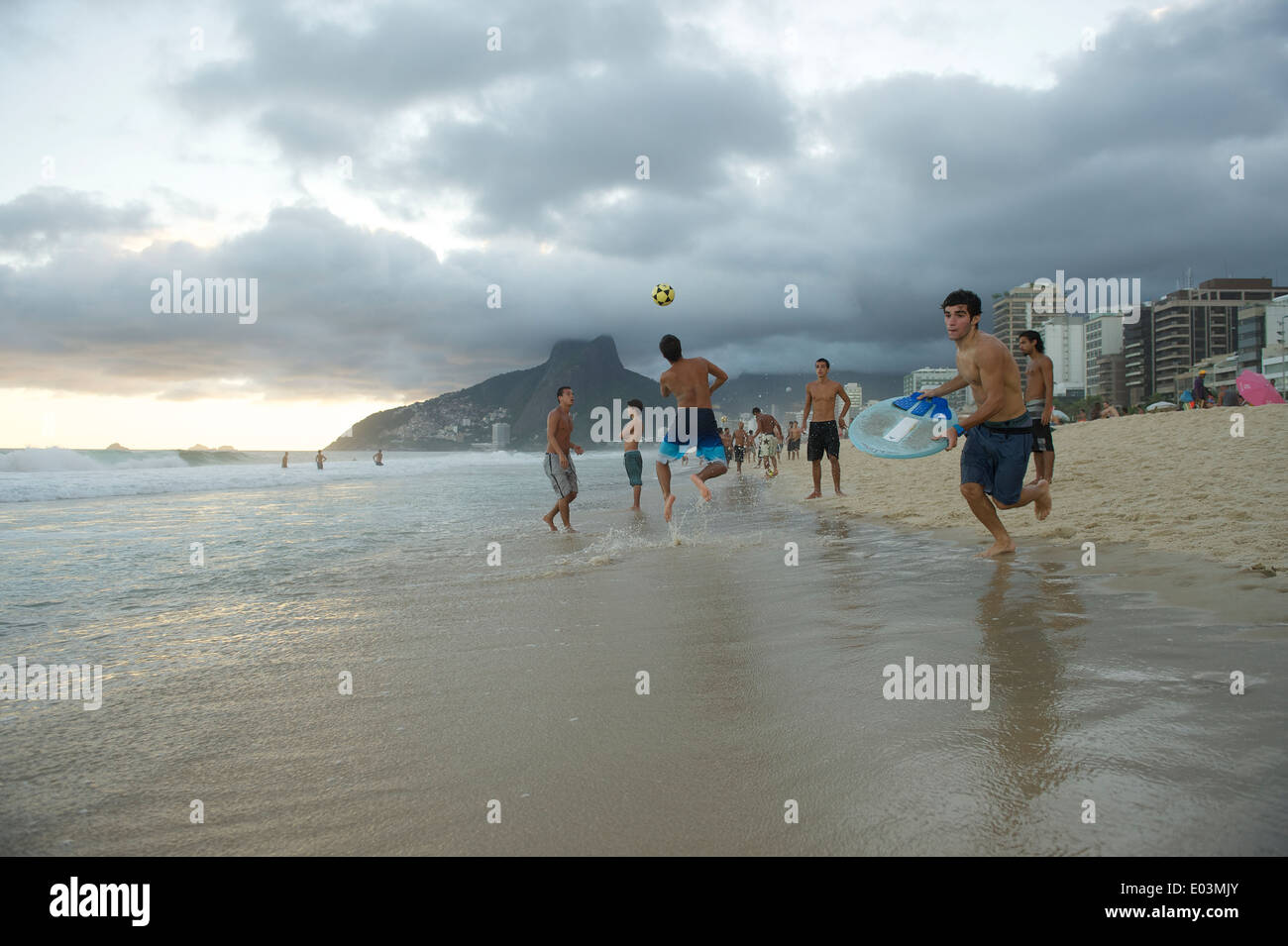 RIO DE JANEIRO, BRAZIL - MARCH 20, 2014: Group of Brazilians play a ...
