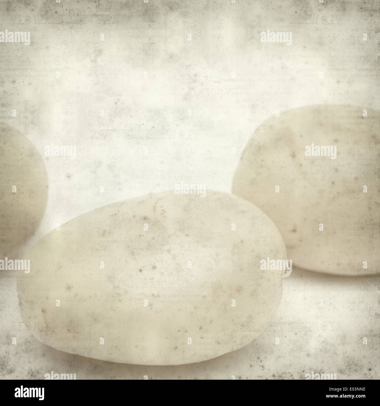 textured old paper background with new potatoes Stock Photo - Alamy