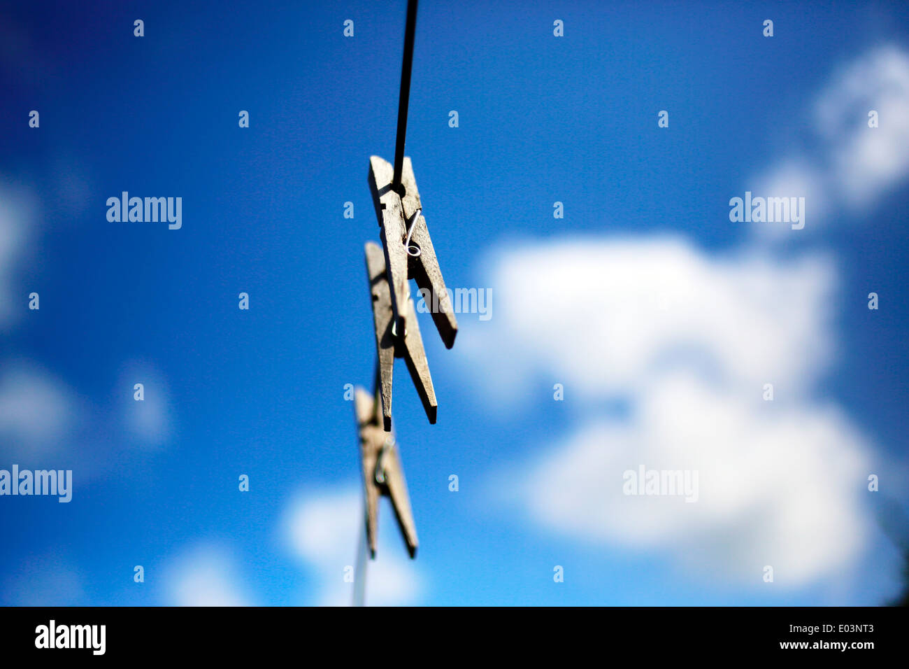 pegs on washing line Stock Photo - Alamy
