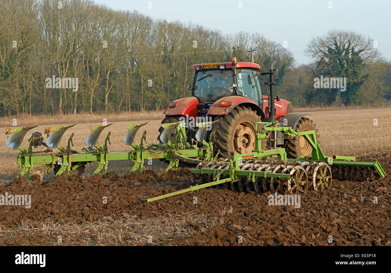 Tractor with plough attached hi-res stock photography and images - Alamy
