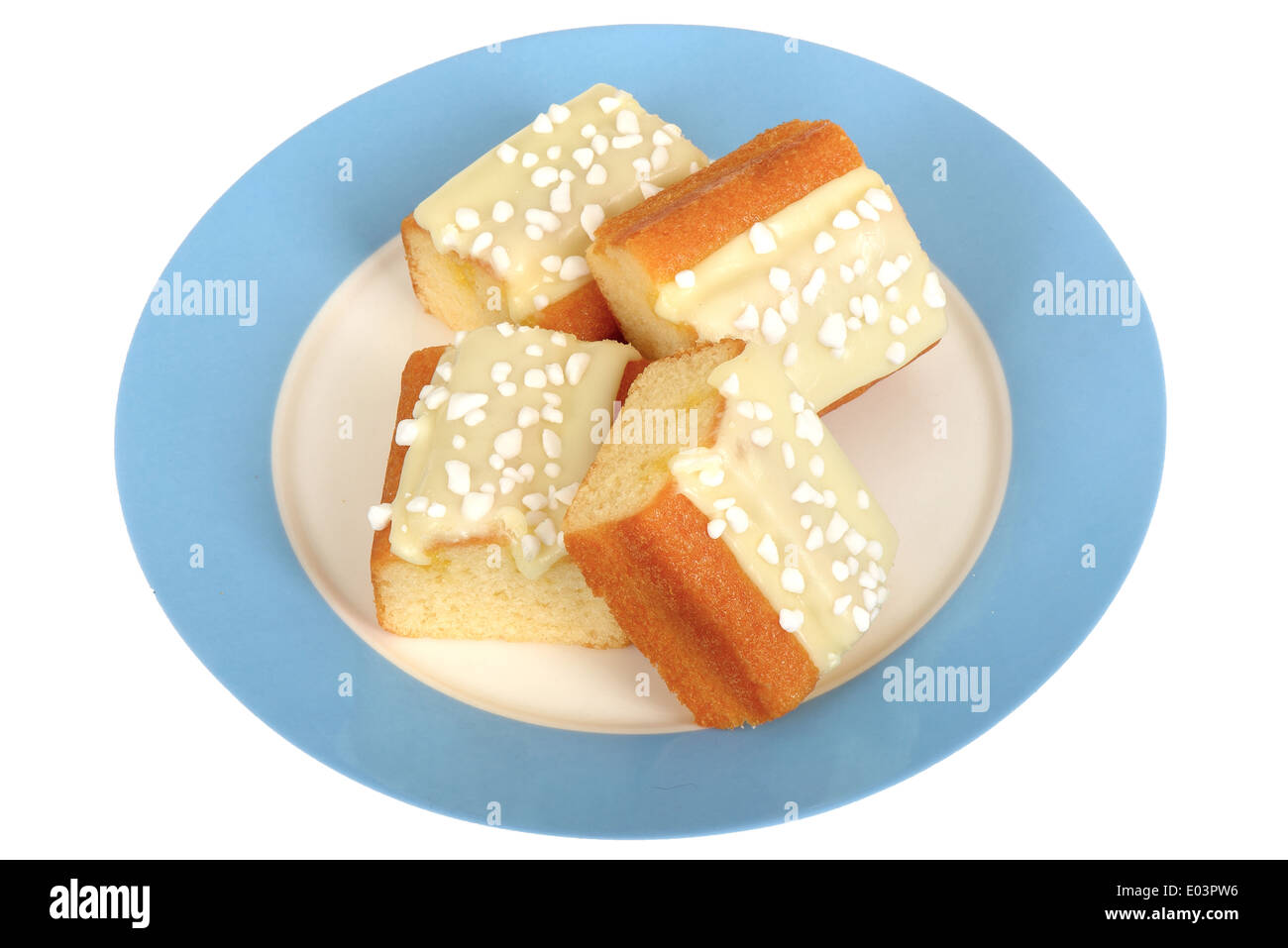 Iced Lemon Sponge Cakes Stock Photo - Alamy
