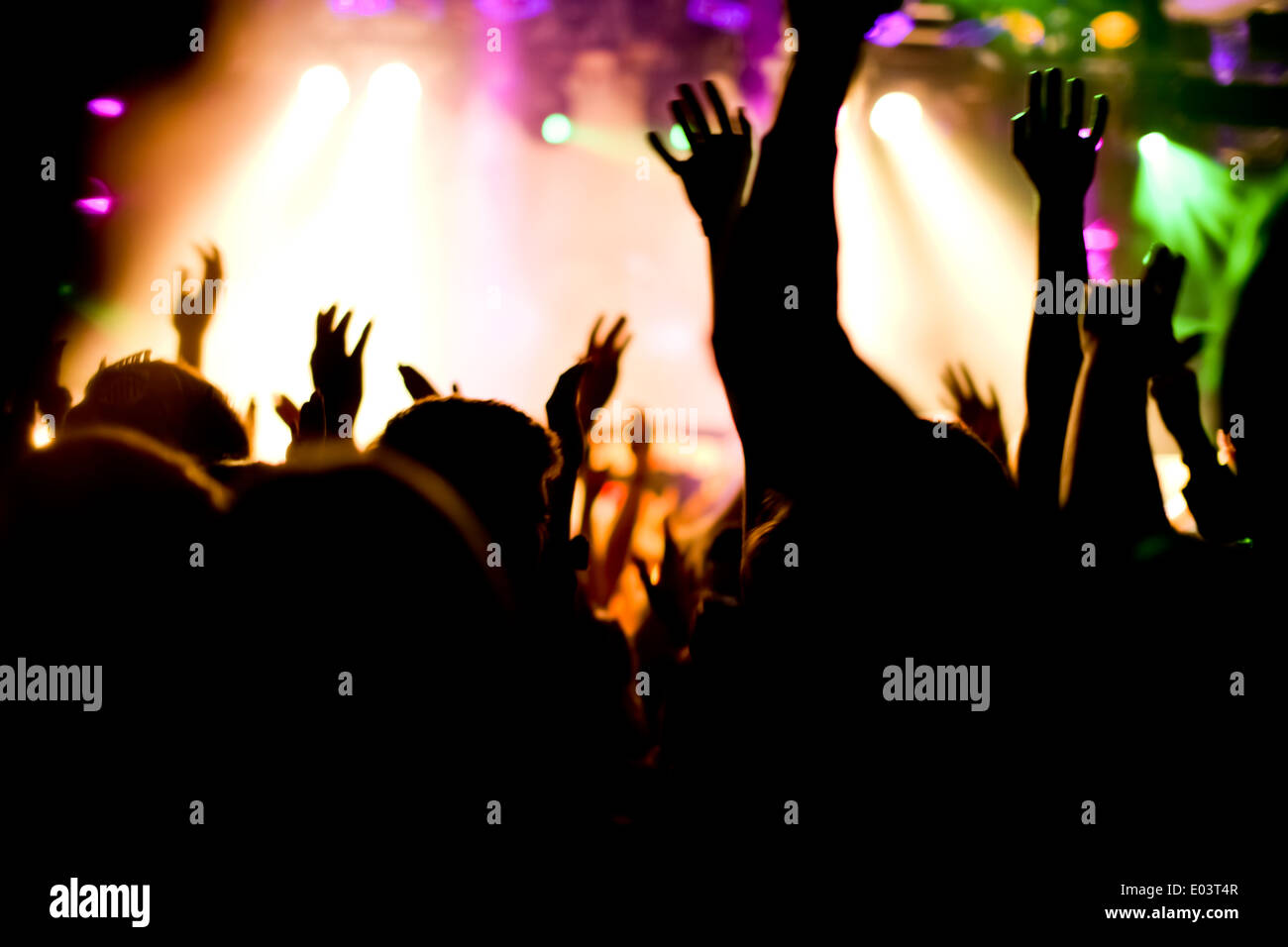 Beautiful dreamy colourful image of a nightclub interior with people ...