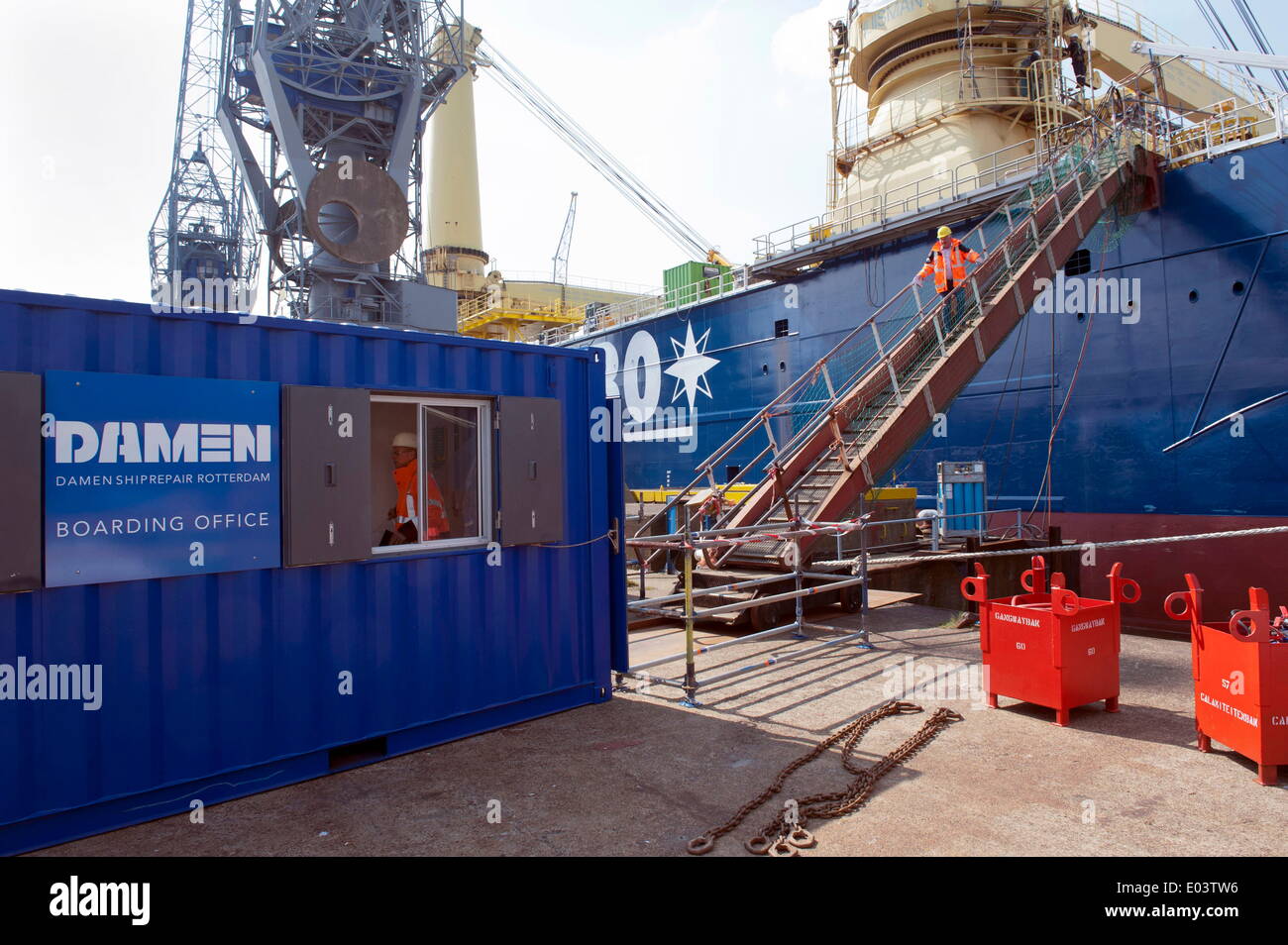 Rotterdam, Netherlands. 23rd Apr, 2014. A dockworker runs from the ...