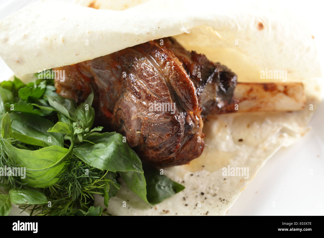hot and tasty roasted leg on white dish Stock Photo - Alamy