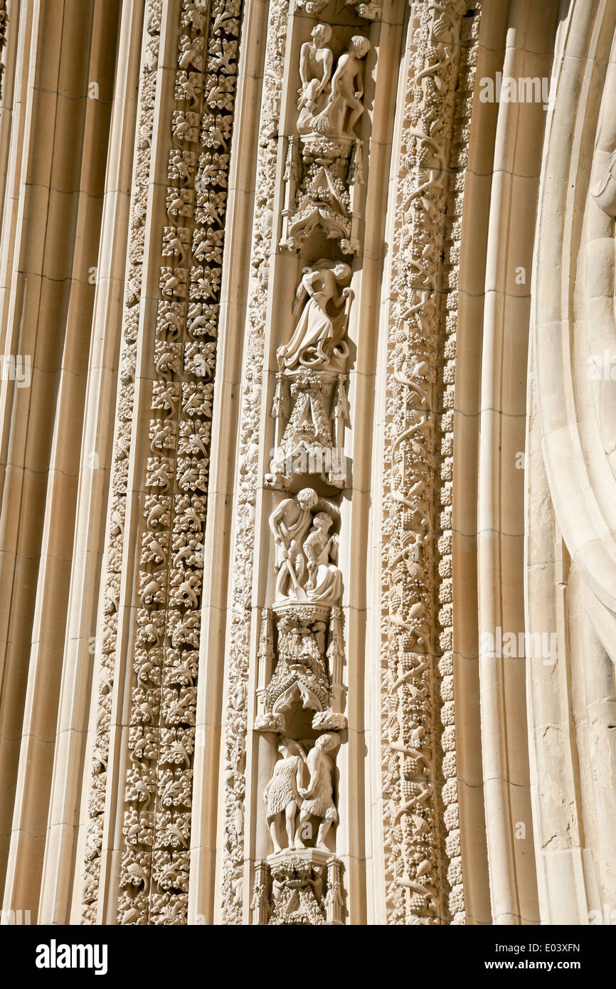Close up of carved stone Stonework ornate detail figures on surround of ...