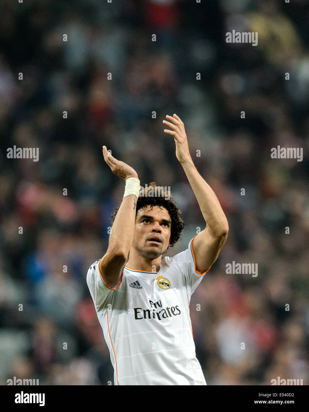 Munich, Germany. 29th Apr, 2014. Madrid's Pepe cheers after the ...