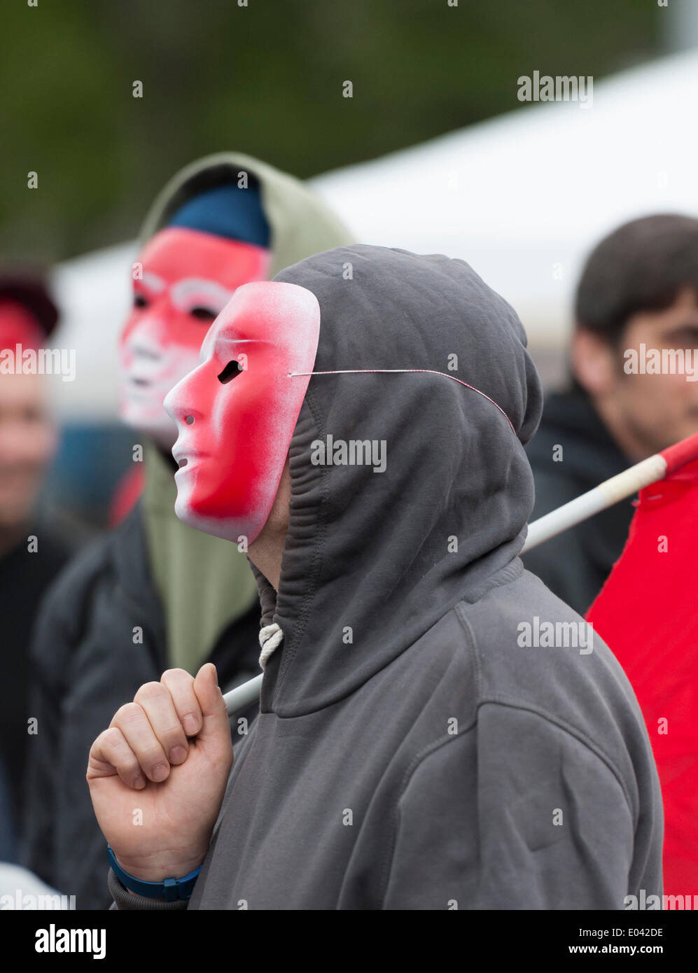 Masked activists hi-res stock photography and images - Alamy
