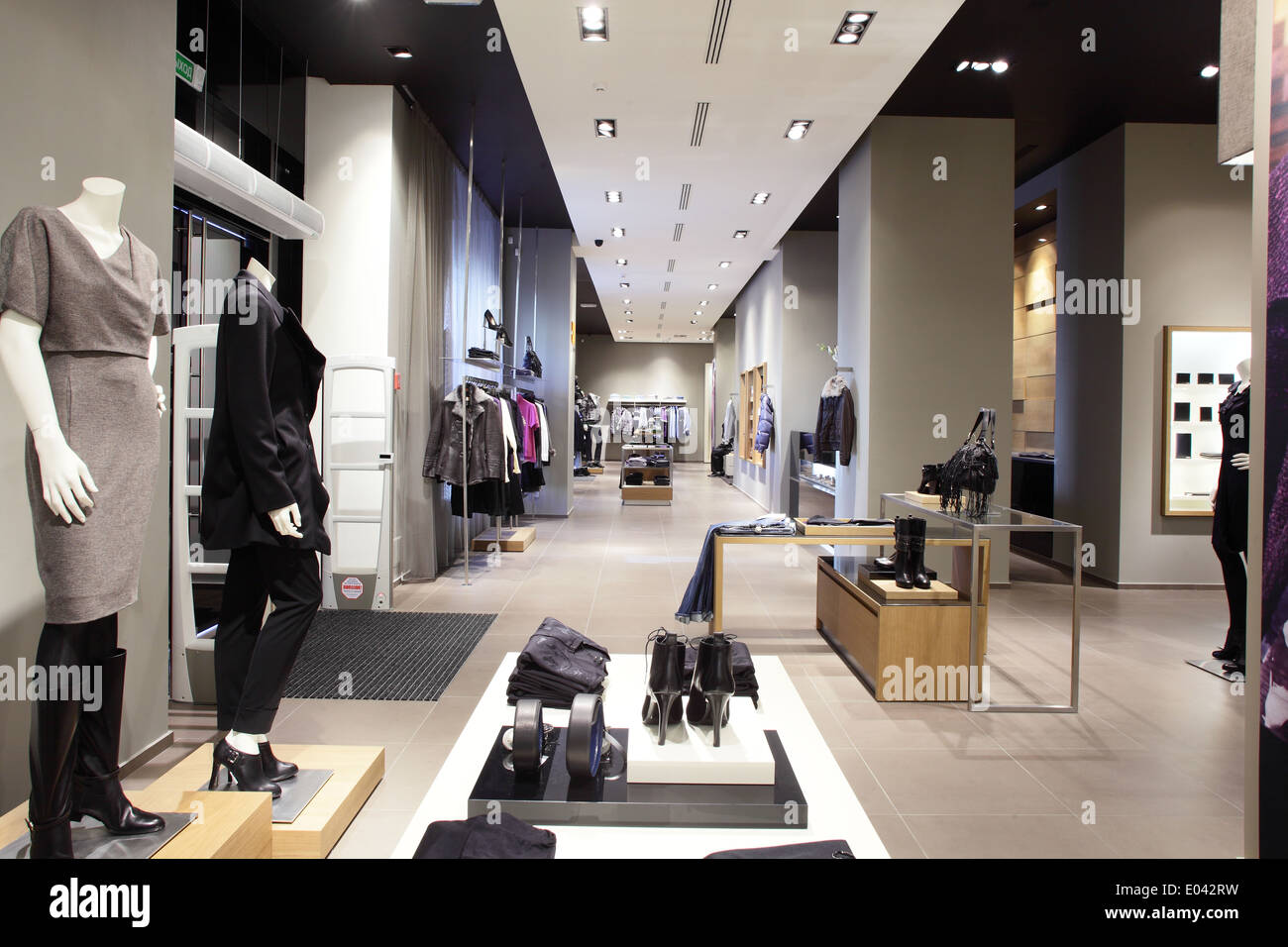 interior of brand new fashion clothes store Stock Photo - Alamy