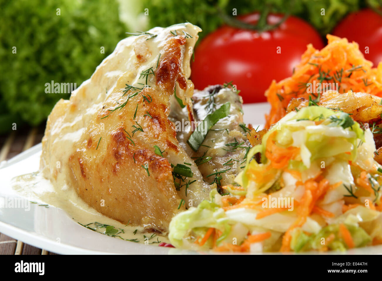 fresh and tasty peaces of meat with garnish Stock Photo - Alamy