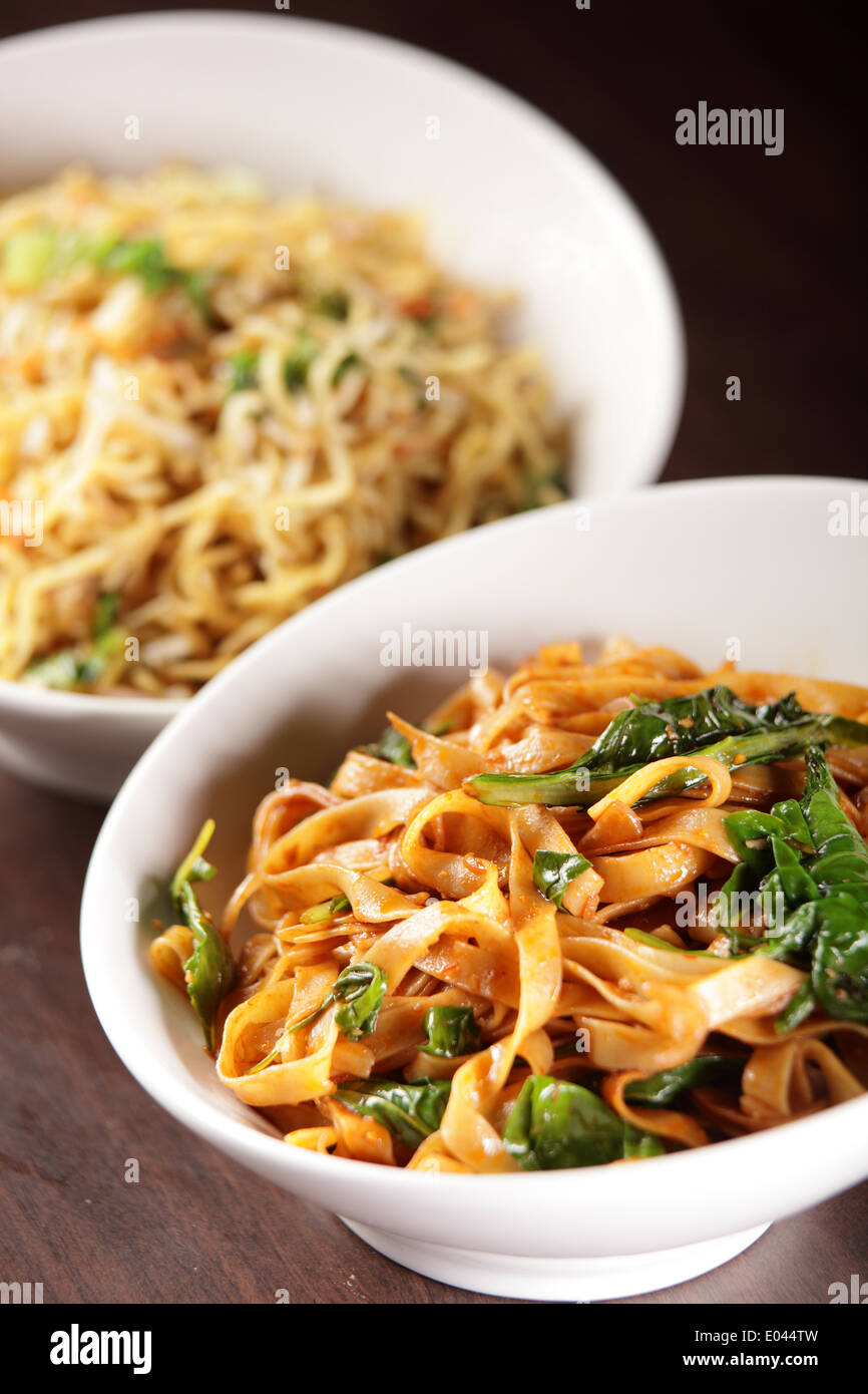 tasty and hot chinese spaghetti with garnish Stock Photo - Alamy
