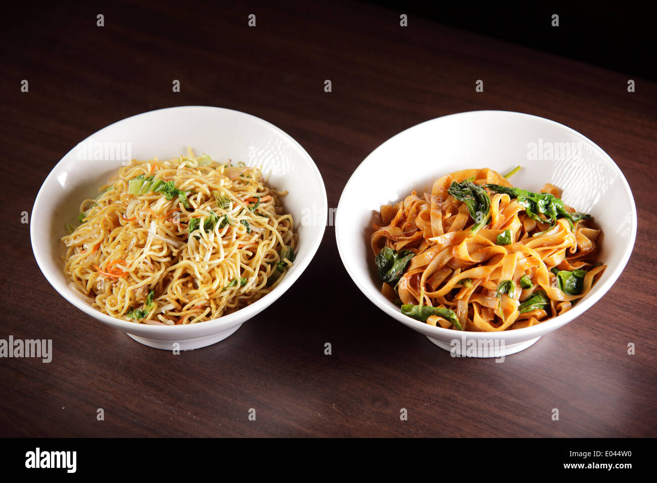 tasty and hot chinese spaghetti with garnish Stock Photo - Alamy