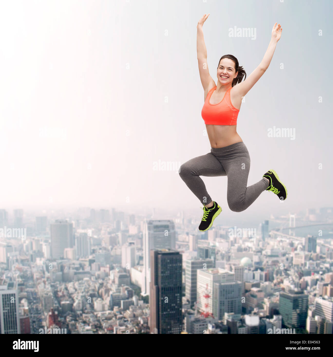 sporty teenage girl jumping in sportswear Stock Photo - Alamy