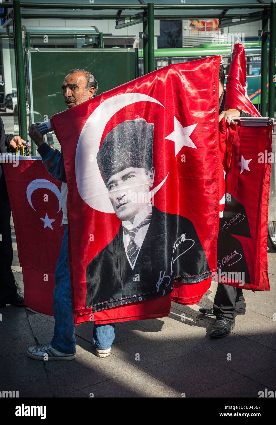 Flag sellers with turkish flags with portrait of Mustafa Kemal Ataturk ...