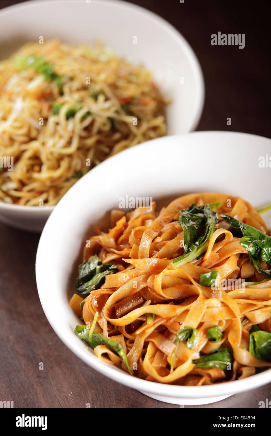 tasty and hot chinese spaghetti with garnish Stock Photo - Alamy