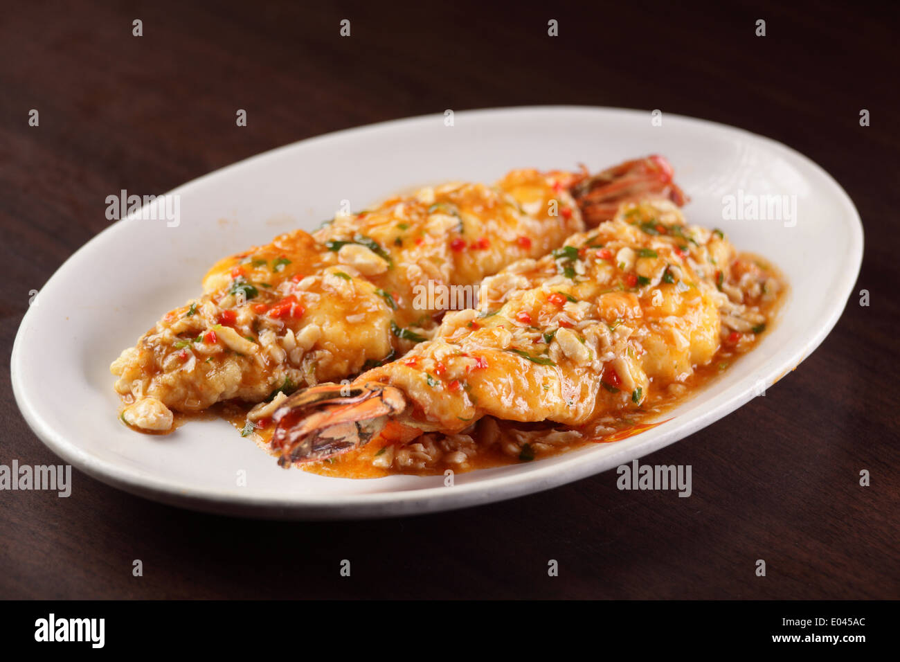 fresh tasty and colorful chinese food on wooden background Stock Photo ...