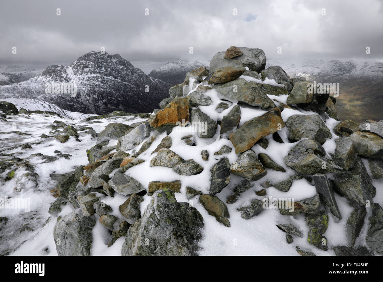 Cairn at the summit of Y Foel Goch, with Tryfan in the distance ...