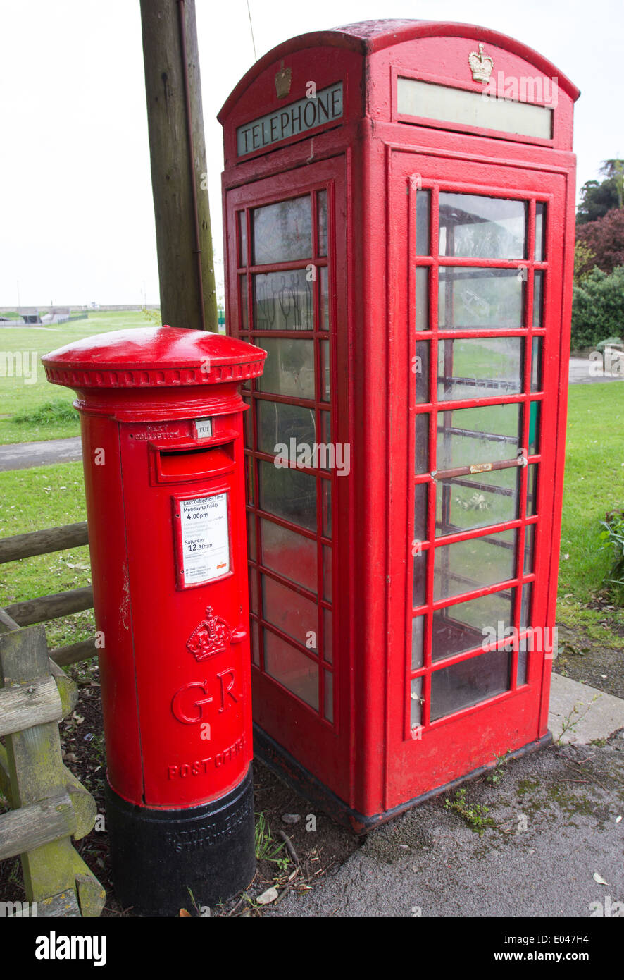 A red classic English phone box and post box in Clevedon, North ...