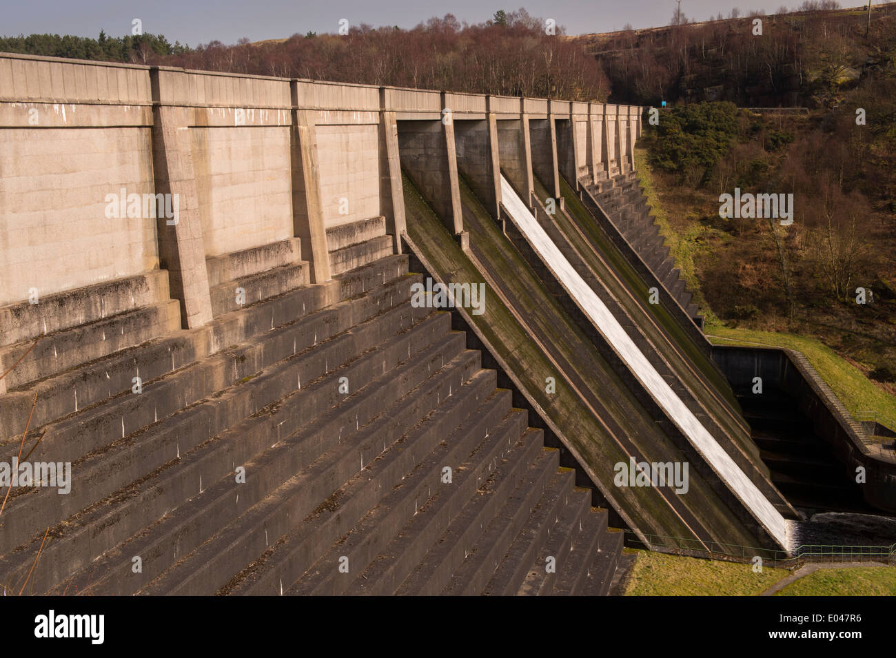 Close-up view of water flowing over a section of the high, steep-sided ...
