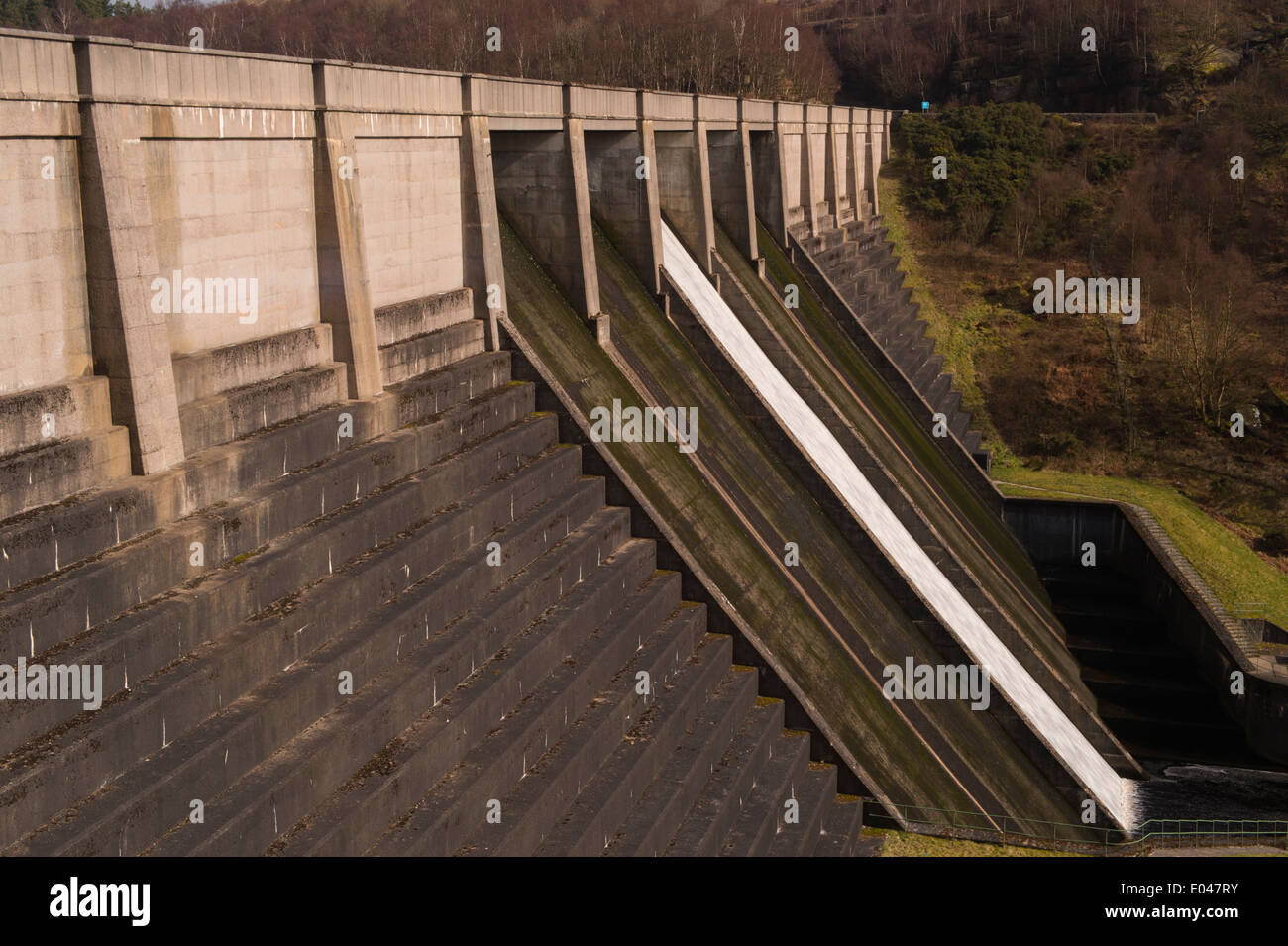 Close-up view of water flowing over a section of the high, steep-sided ...