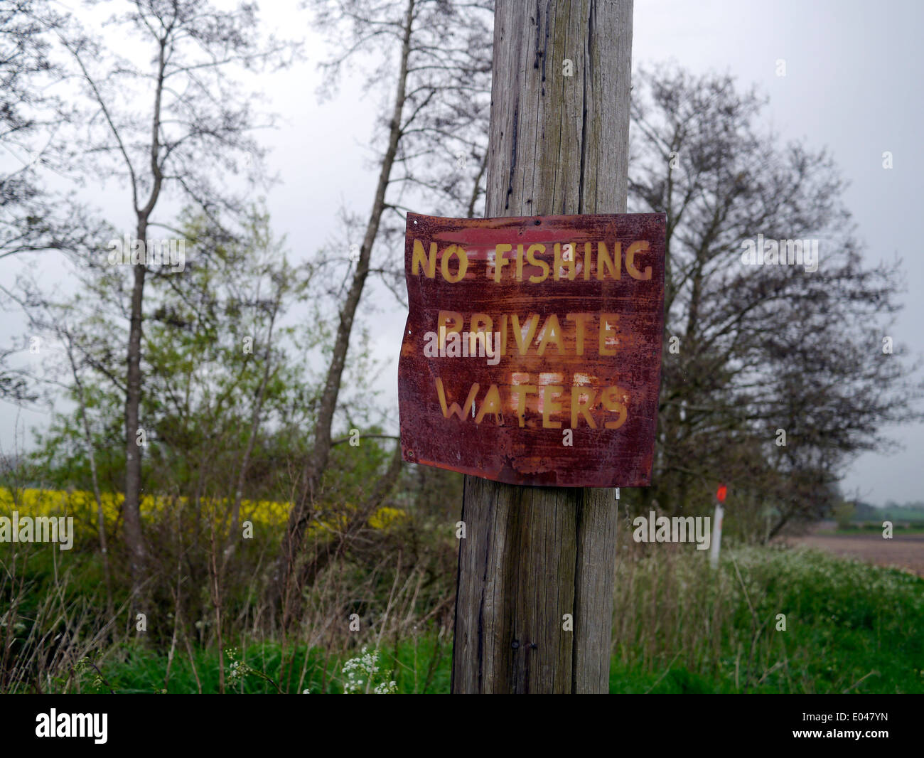 No fishing private waters sign Stock Photo - Alamy