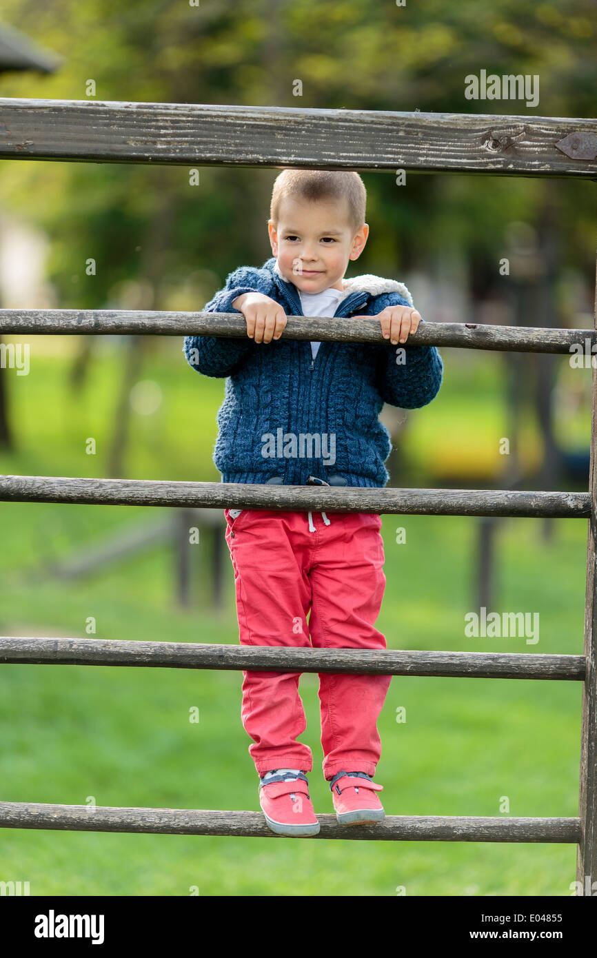 Little boy at playground Stock Photo - Alamy