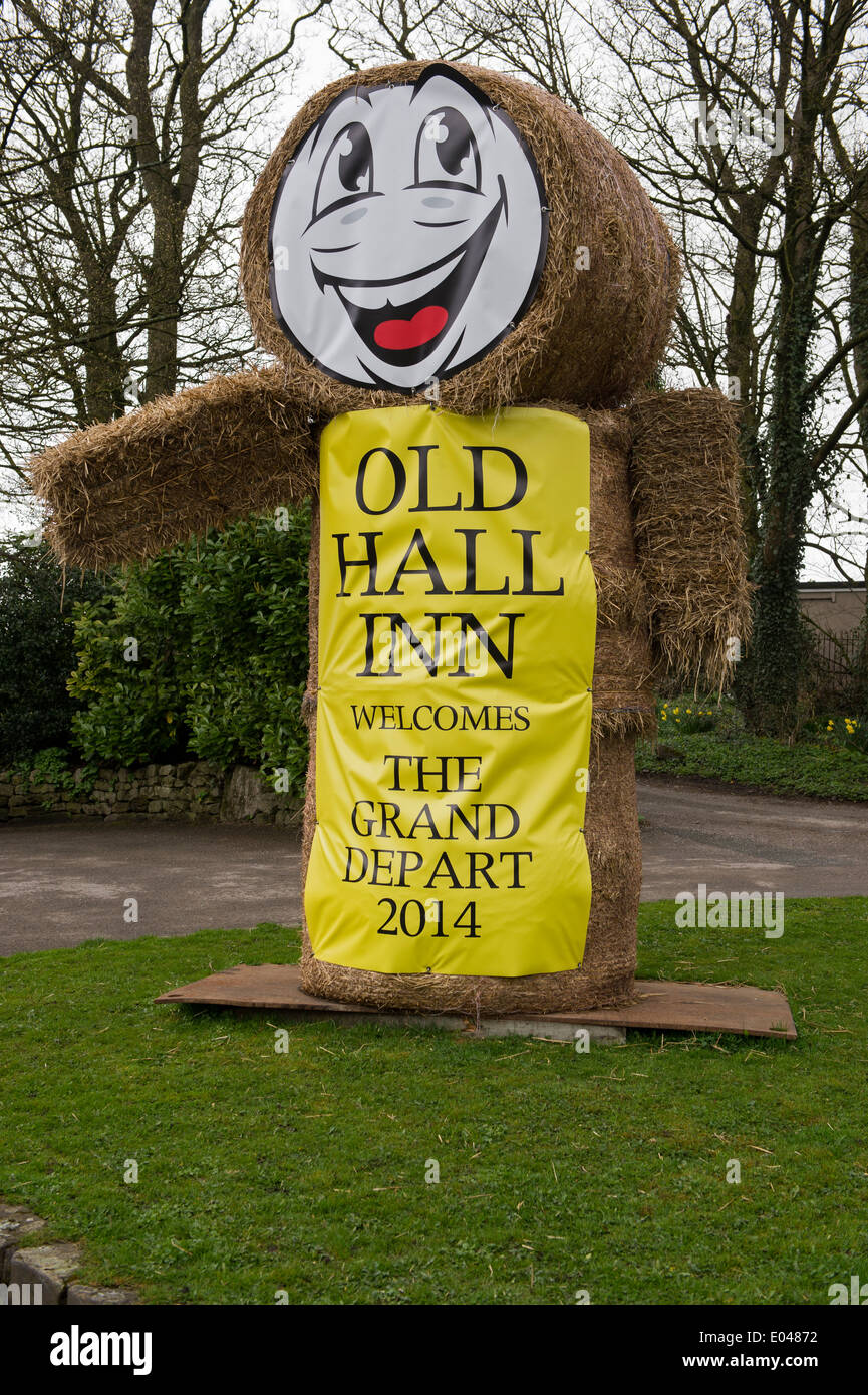 Tall figure made of straw bales & yellow banner is welcoming visitors ...