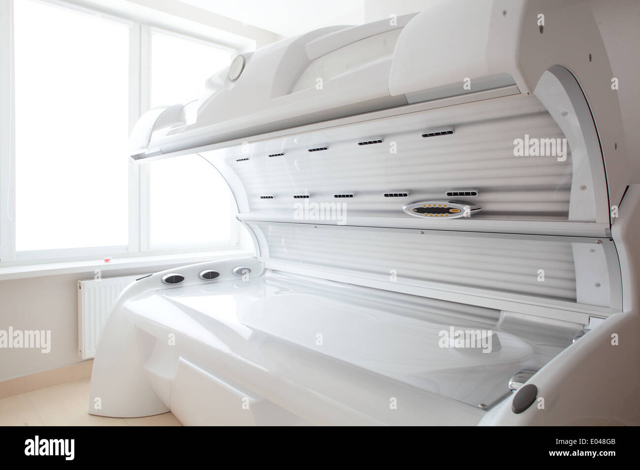 opened solarium in white room in european style Stock Photo - Alamy