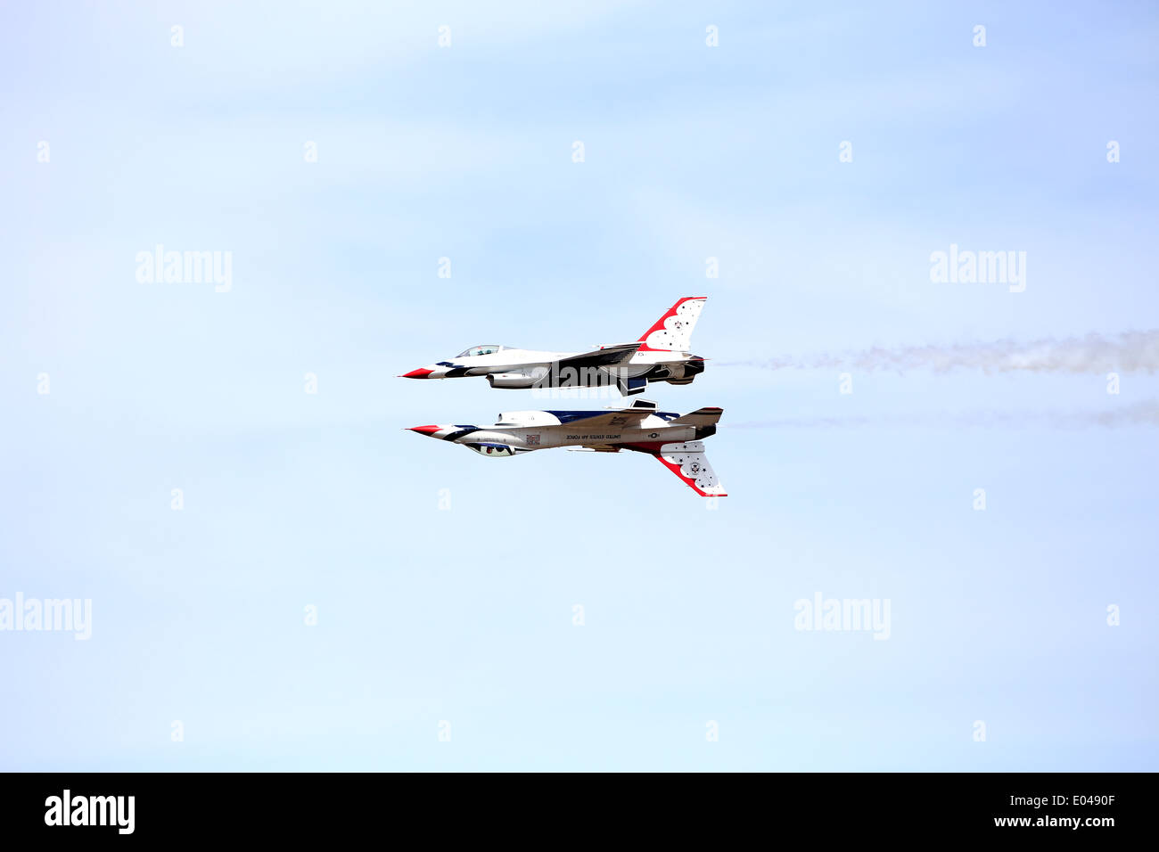 USAF Air Demonstration Squadron ("Thunderbirds") with 2 planes one over ...