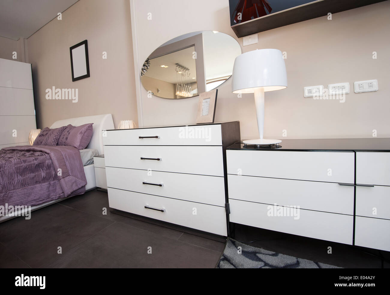 Dresser unit and drawers in bedroom area of furniture show home Stock ...