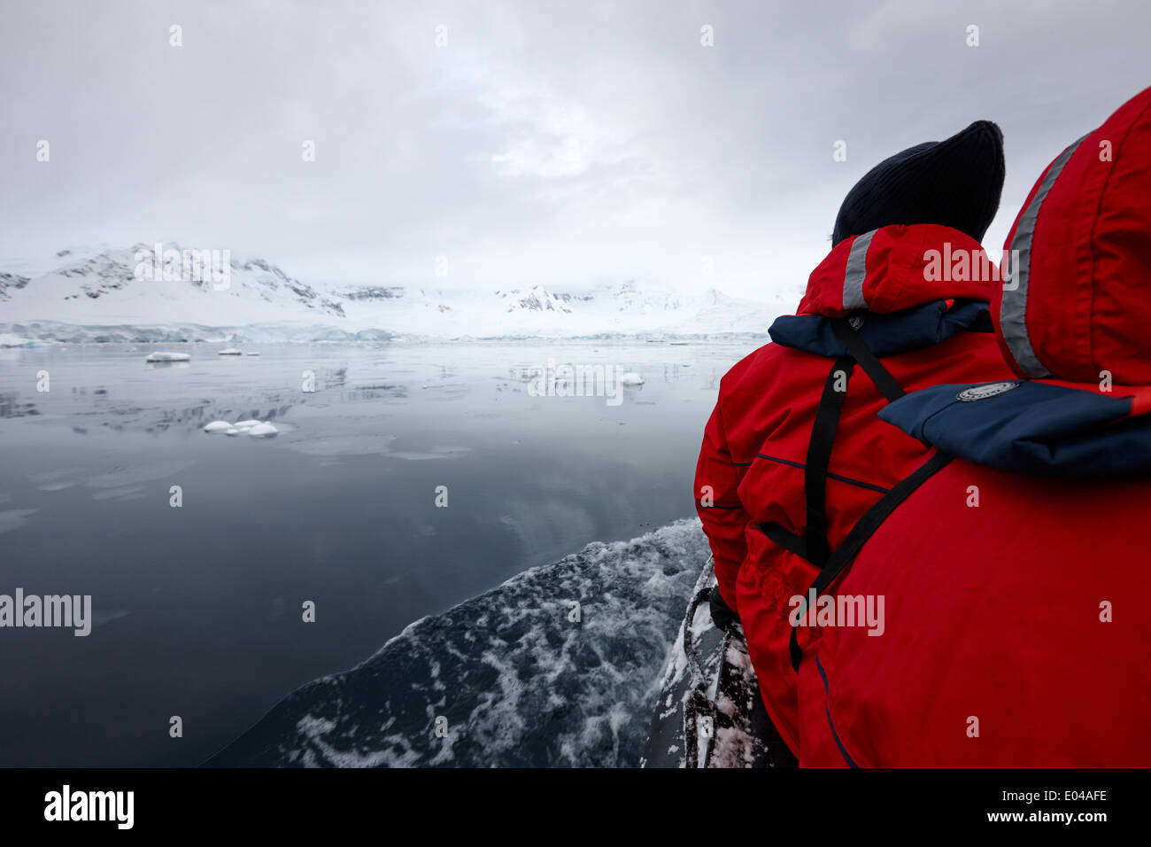 passengers on board a zodiac exploring fournier bay on excursion in ...