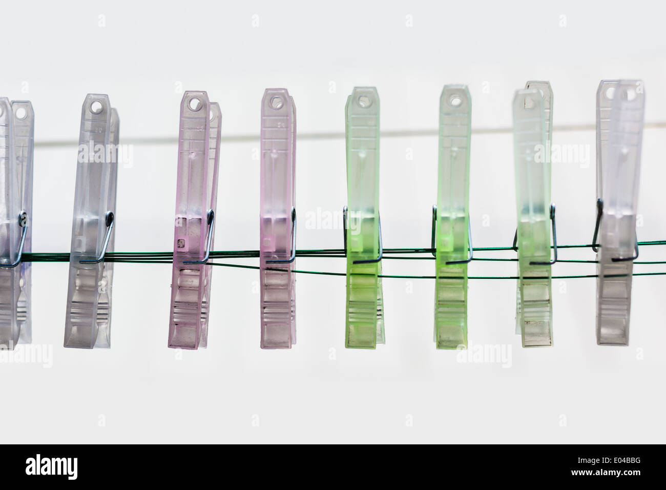 some colored clothes pegs isolated over a white background Stock Photo ...