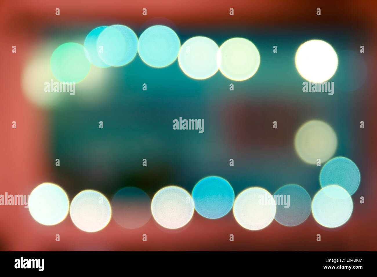 Holidays Lights on the window. Blurry pattern of colorful decoration ...