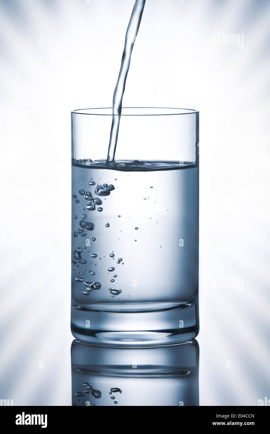 close up view of glass full of water on white background Stock Photo ...