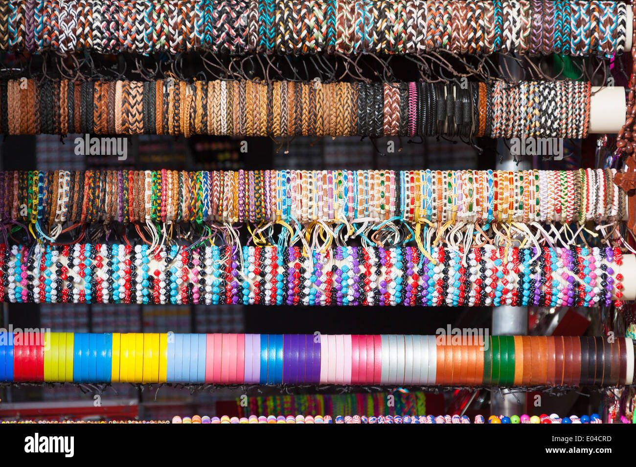A lot of bracelets placed in rows in a market Stock Photo - Alamy